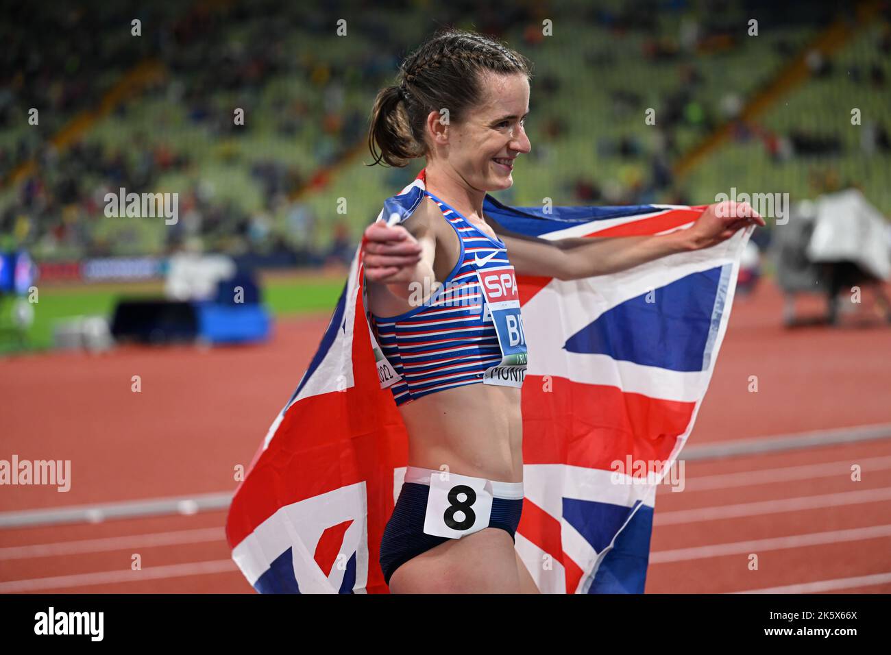 Elizabeth Bird with her country's flag of the 3000m steeplechase at the ...