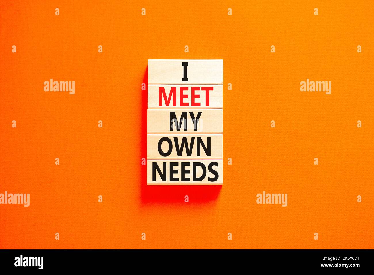 I meet my own needs symbol. Concept words I meet my own needs on wooden ...