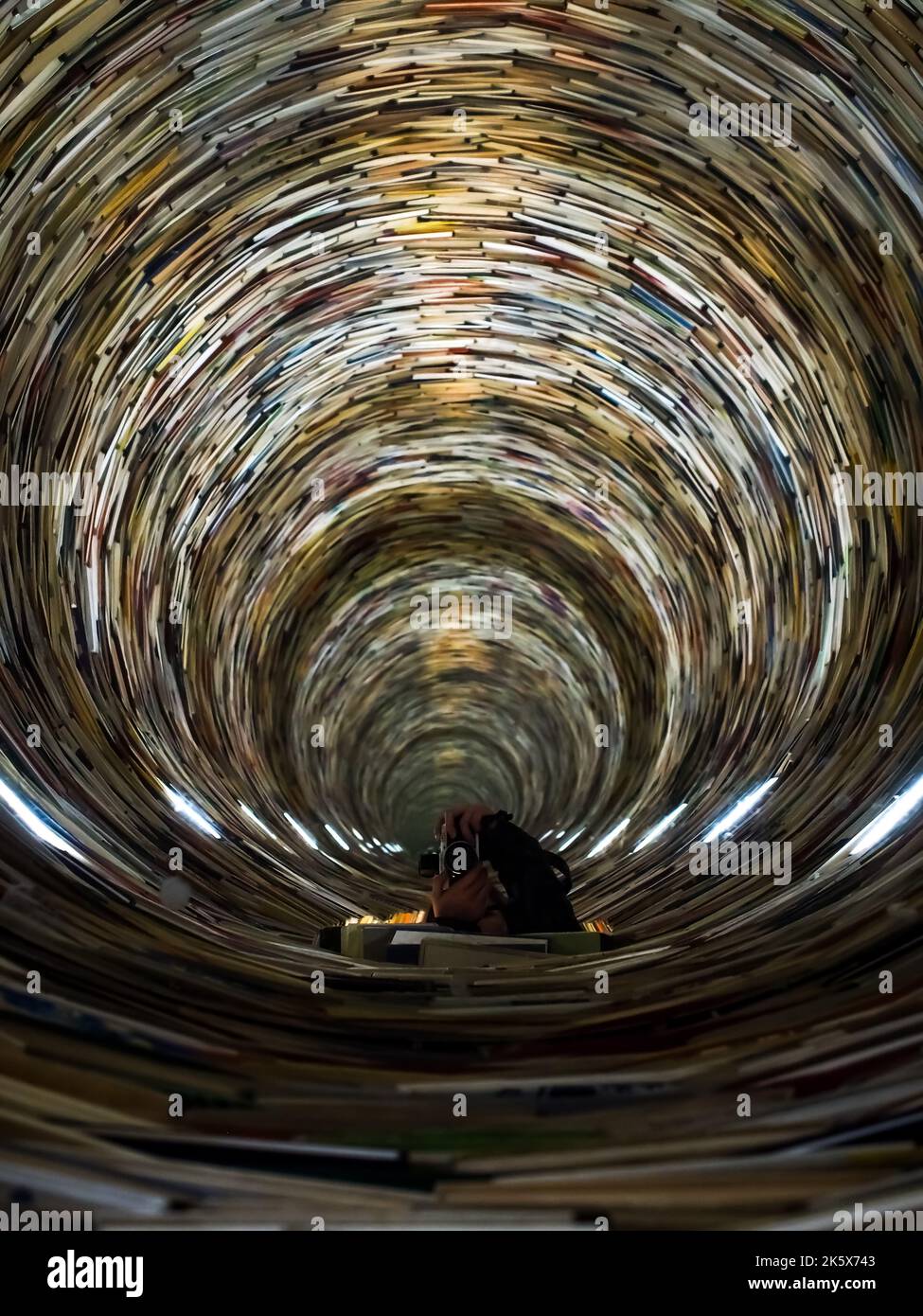 The vertical low-angle view of someone taking a picture of Prague ...