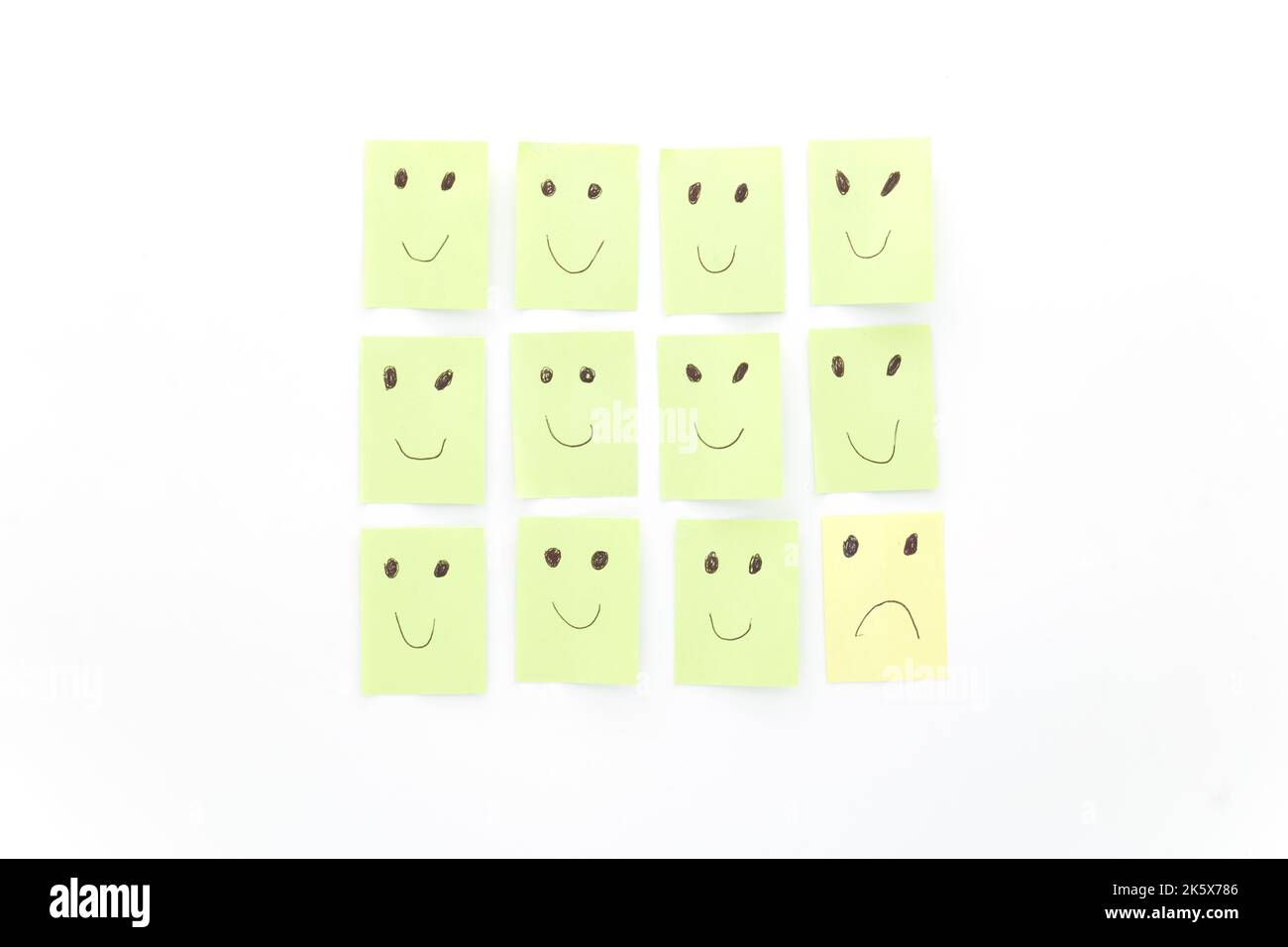 Conceptual image of being sad among happy others. Satisfied ...