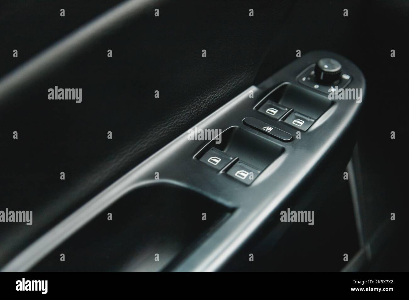 Close Up Of The Side Door Buttons Opening Window And Mirror Switch