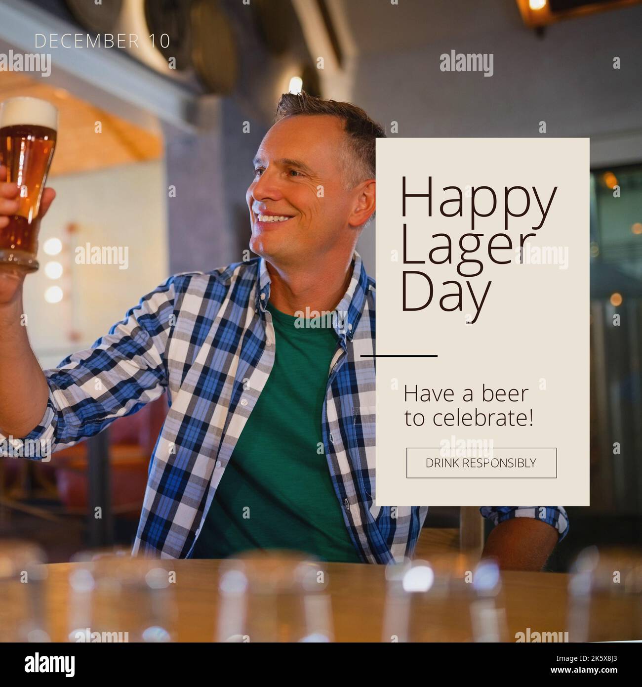 Composition of happy lager day text over caucasian man drinking beer ...
