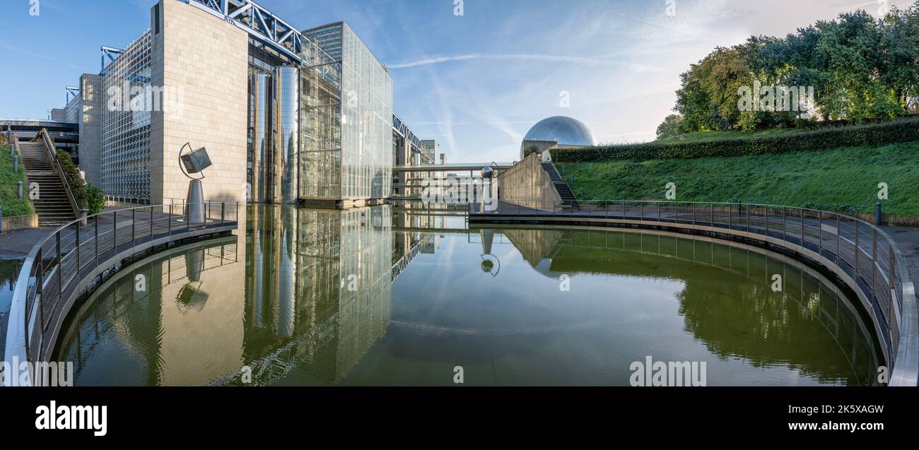 Villette Canal. View of La Geode and building of the Science and ...