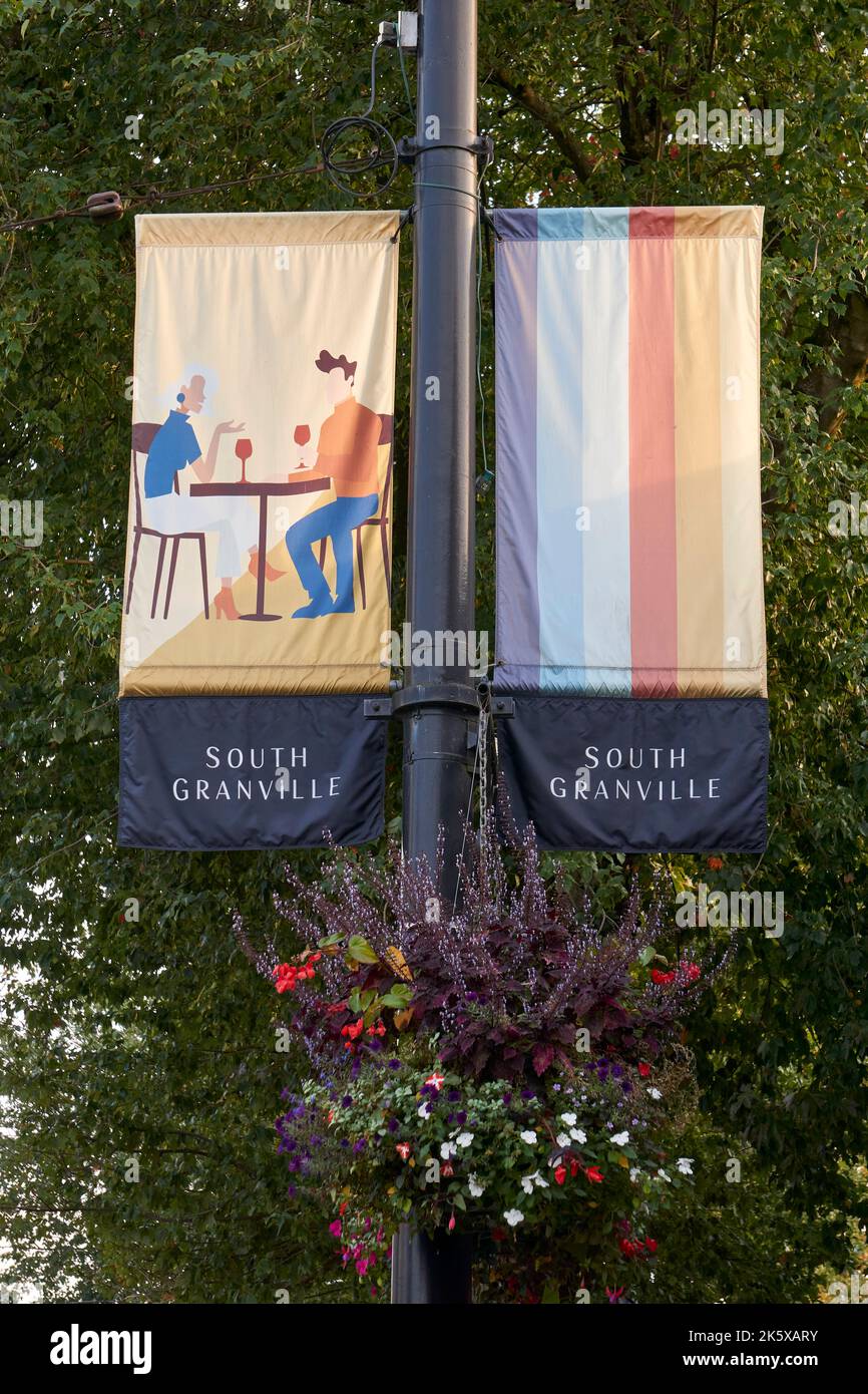Decorative banners on a lamp post in the fashionable South Granville ...