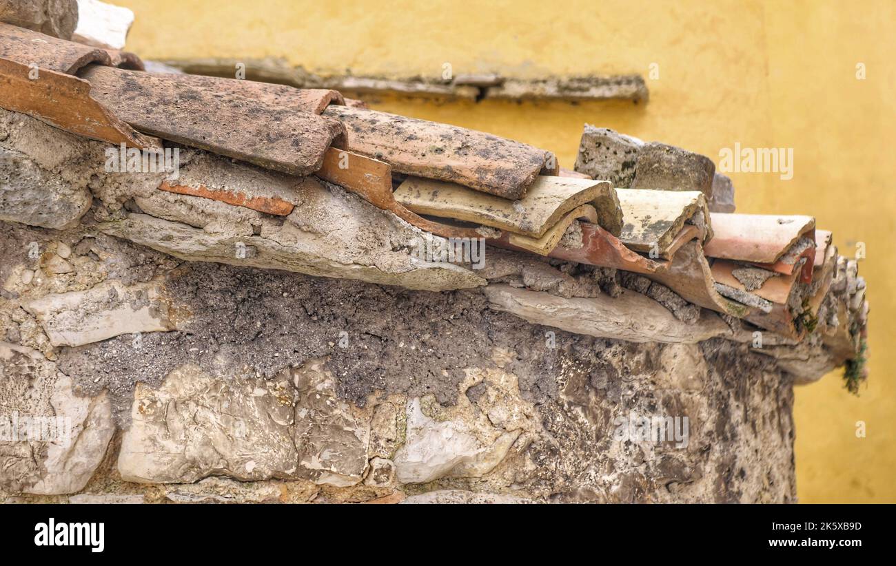 old roof tiles, rotten and destroyed roof tiles on a stone house Stock Photo - Alamy