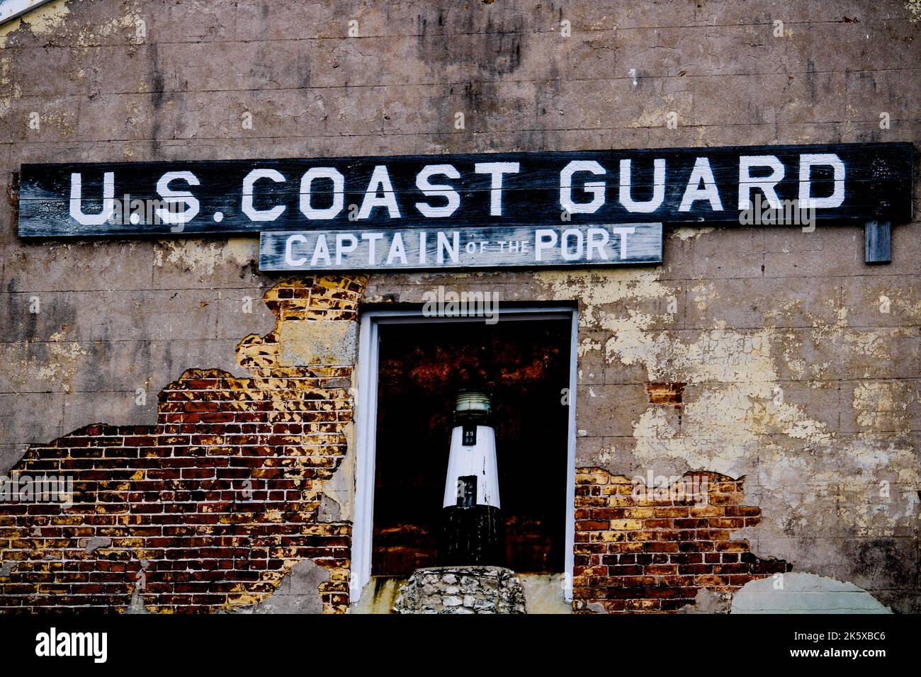 The United States Coast Guard, Captain of the Port written on a brick ...
