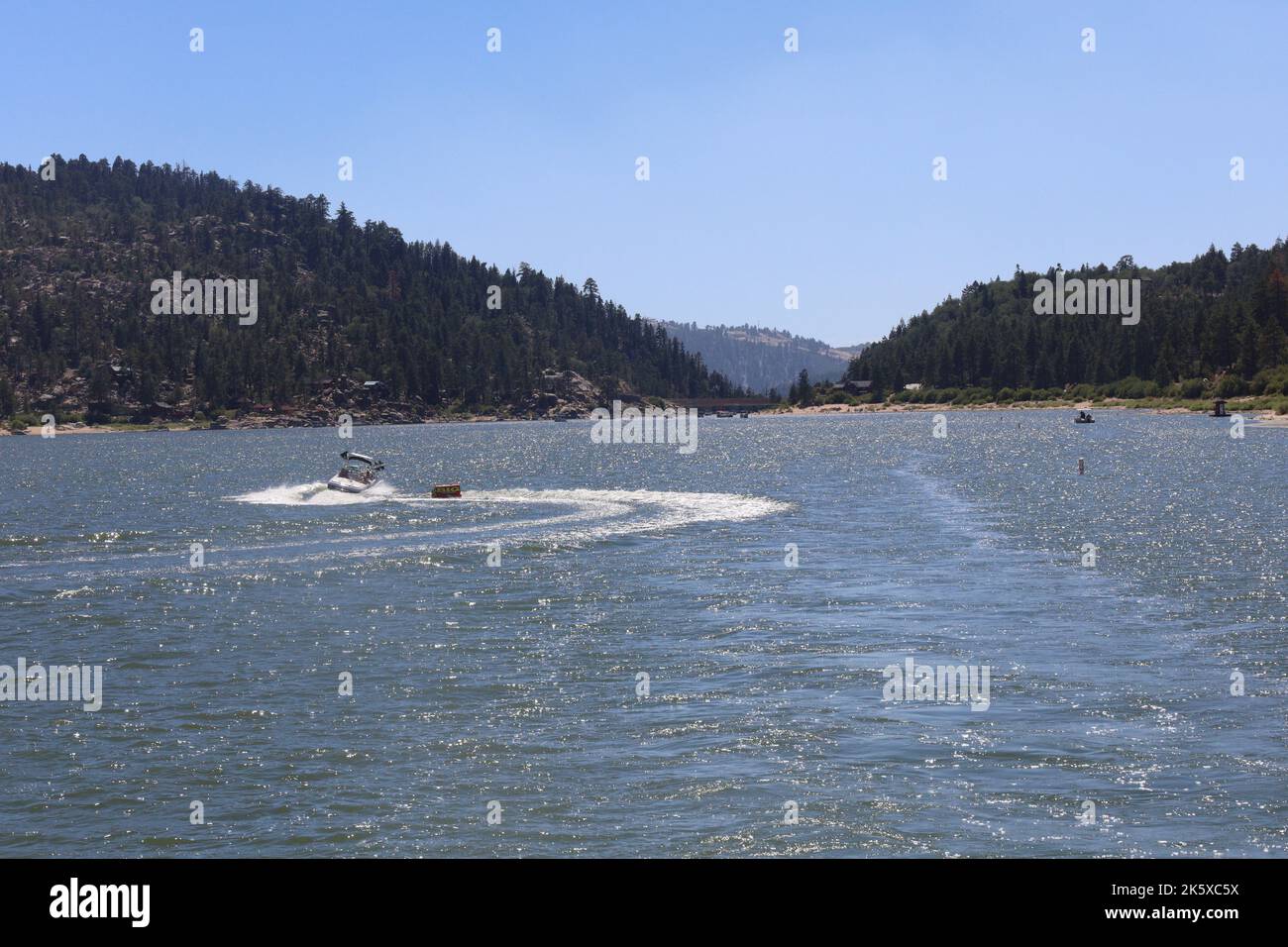 A Boulder Bay park view with lake trees on both sides, the sky in the ...
