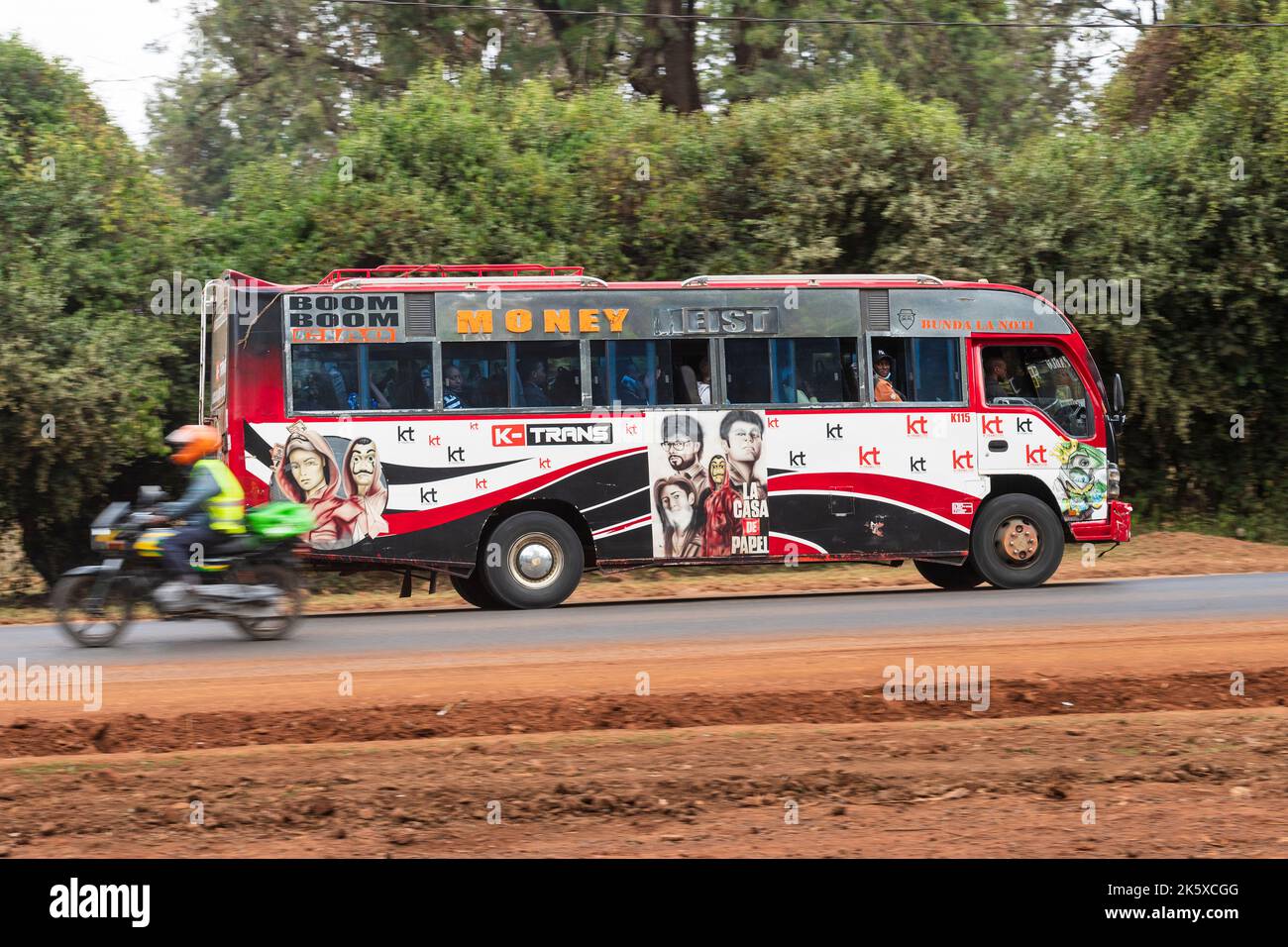 A bus with custom paintwork driving along Ngong road near the junction ...