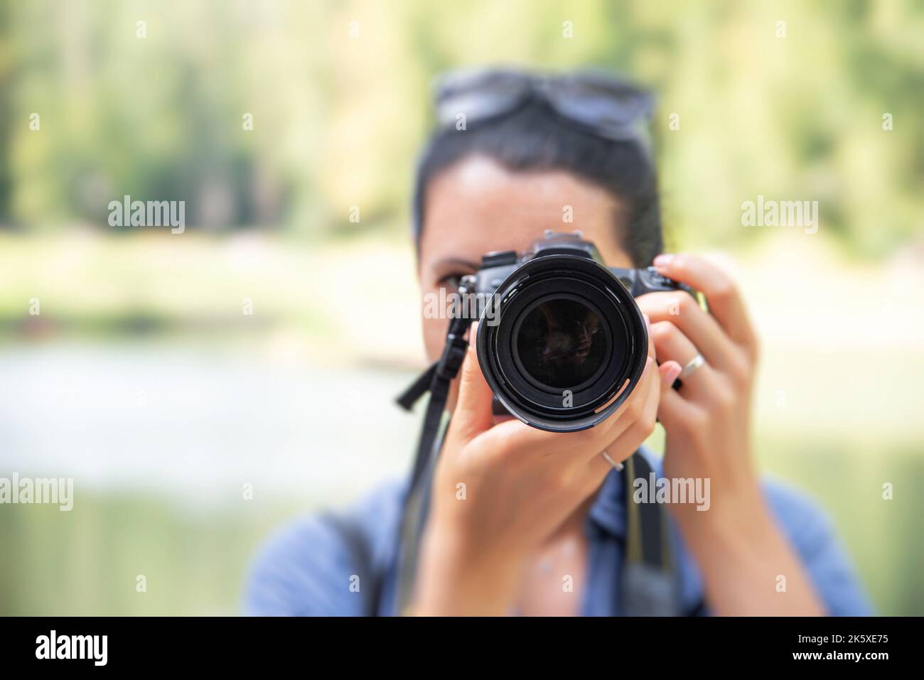 Young women photographer Stock Photo - Alamy