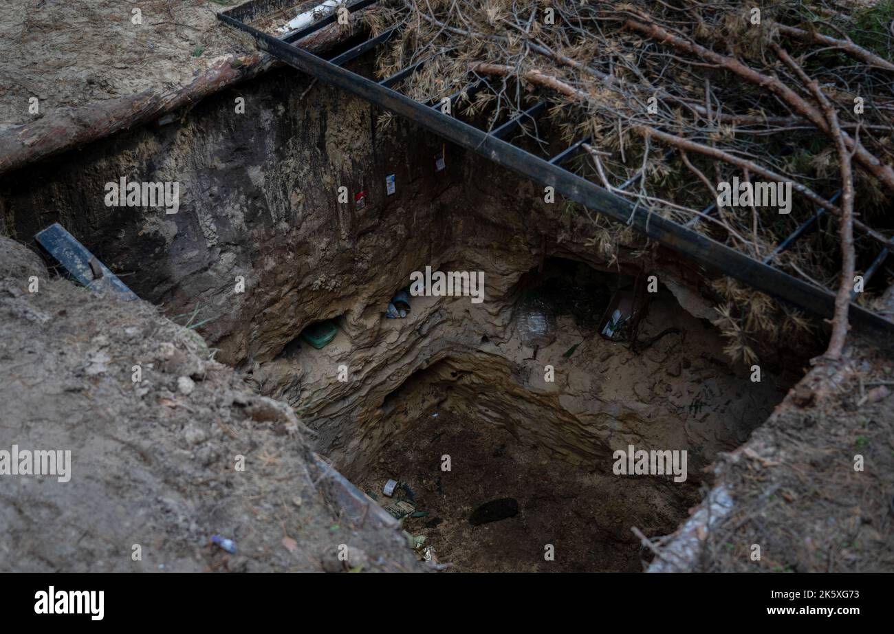 Borova, Ukraine. 07th Oct, 2022. A 4-meter deep pit is seen in a ...