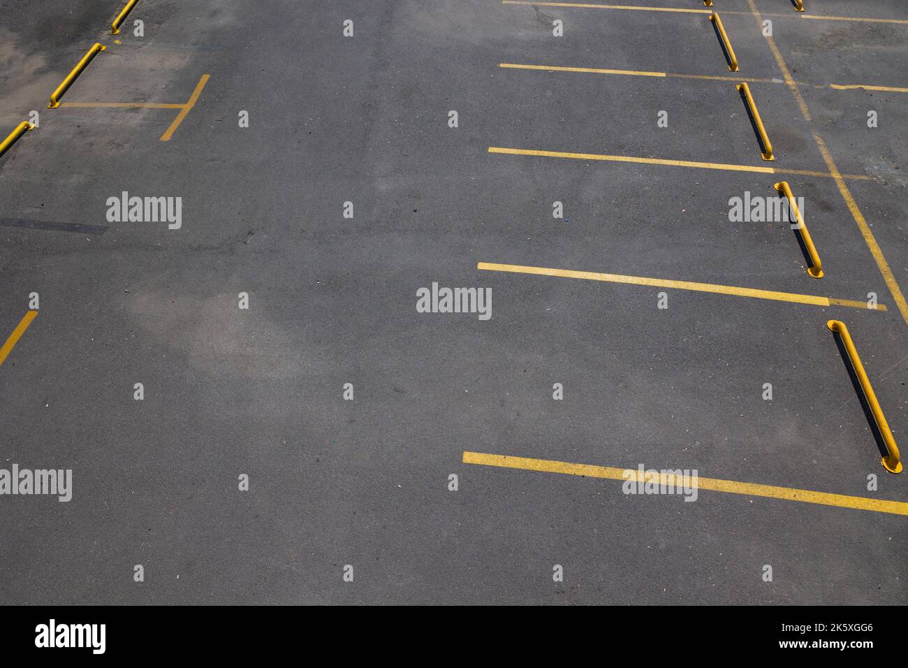 Empty outdoor car parking with yellow laned parking lots. Citylife ...