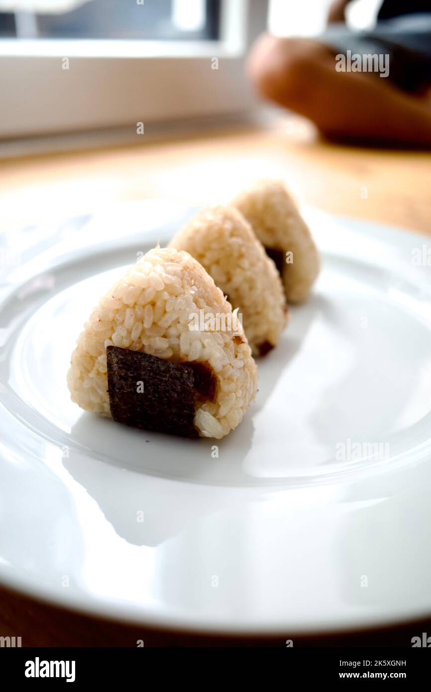 Onigiri, also known as omusubi, nigirizushi, or rice ball, is a ...
