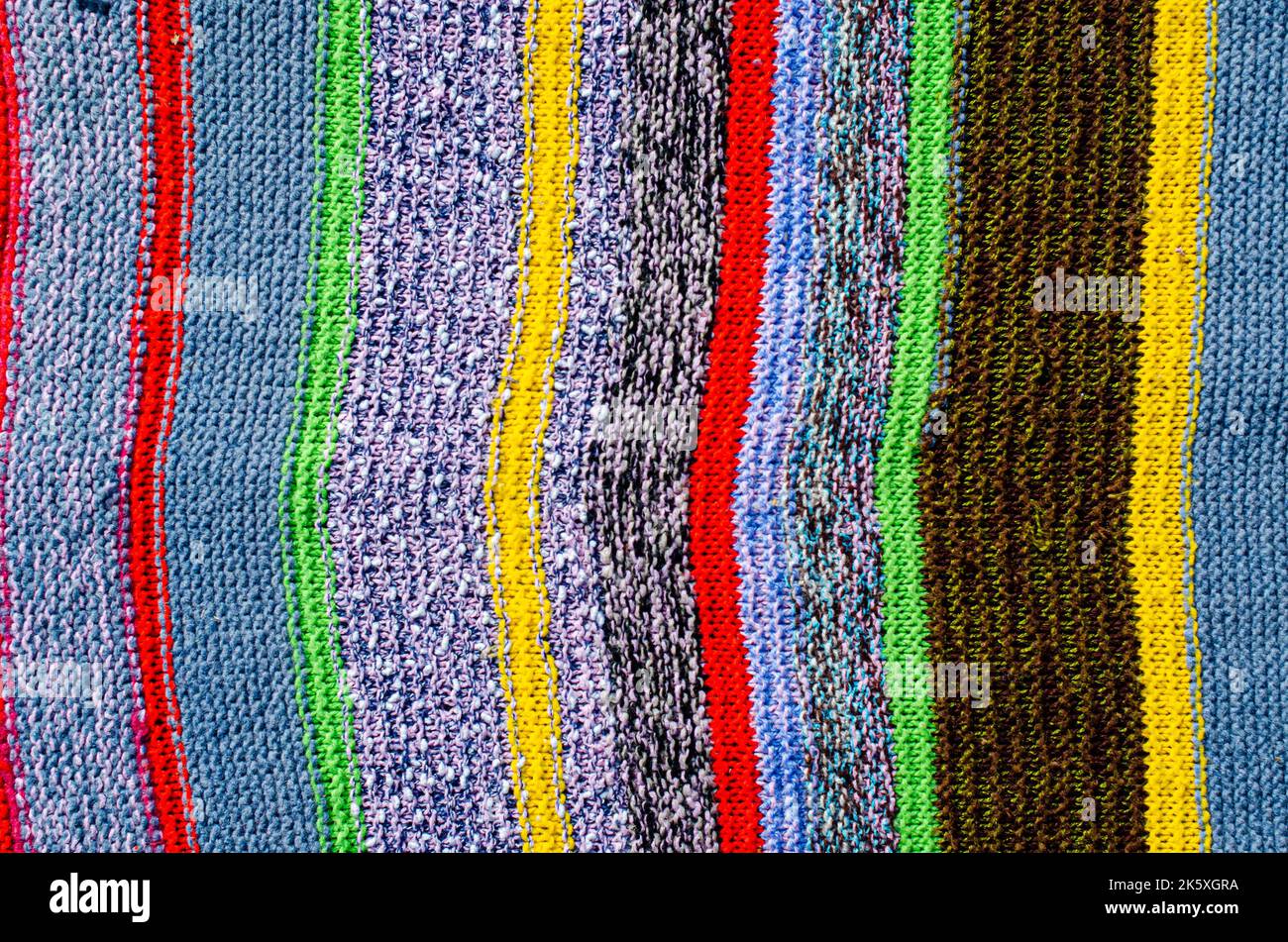 different colored stripes on the knitted fabric surface. textiles retro ...