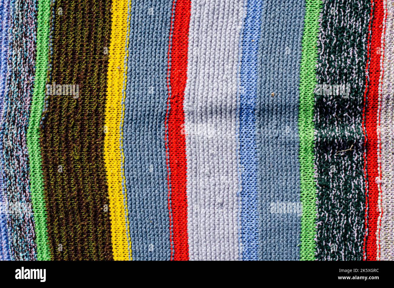 different colored stripes on the knitted fabric surface. textiles retro ...