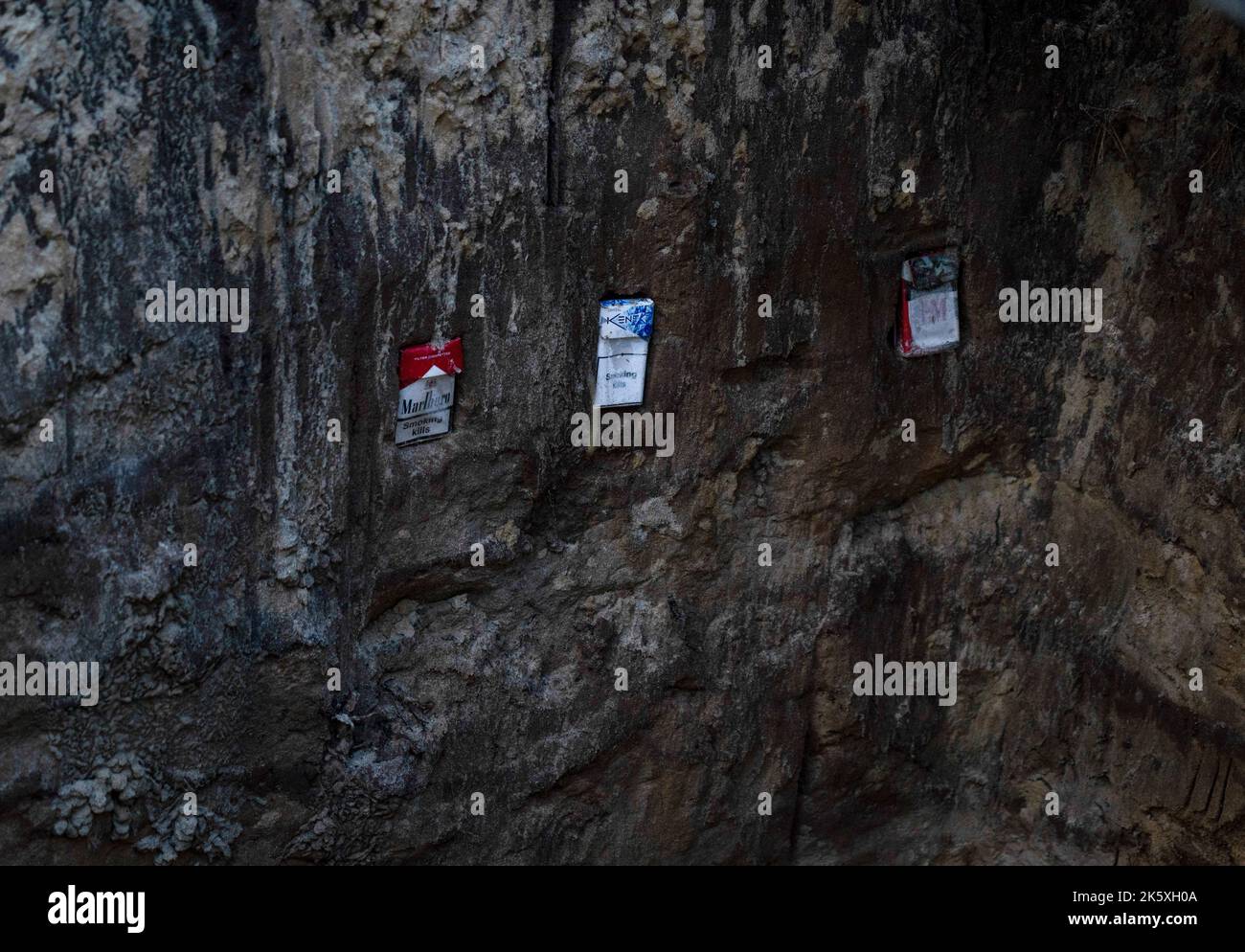 Borova, Ukraine. 07th Oct, 2022. Packets of cigarettes are seen stuck ...
