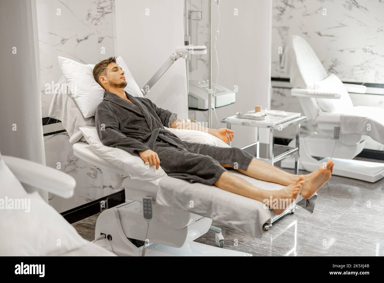 Man during blood wash procedure at medical centre Stock Photo - Alamy