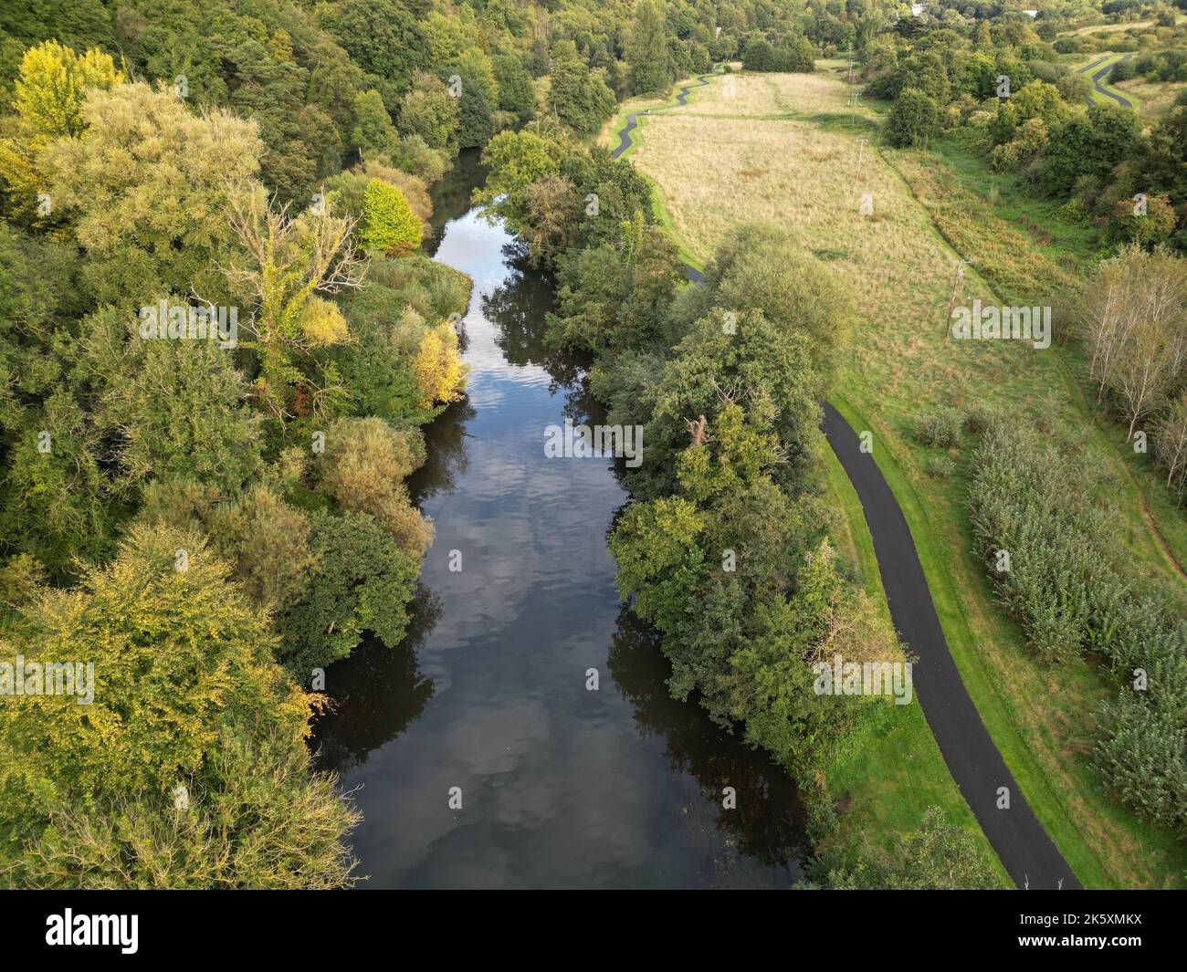 An aerial view of a river surrounded by greenery in Ireland Stock Photo ...