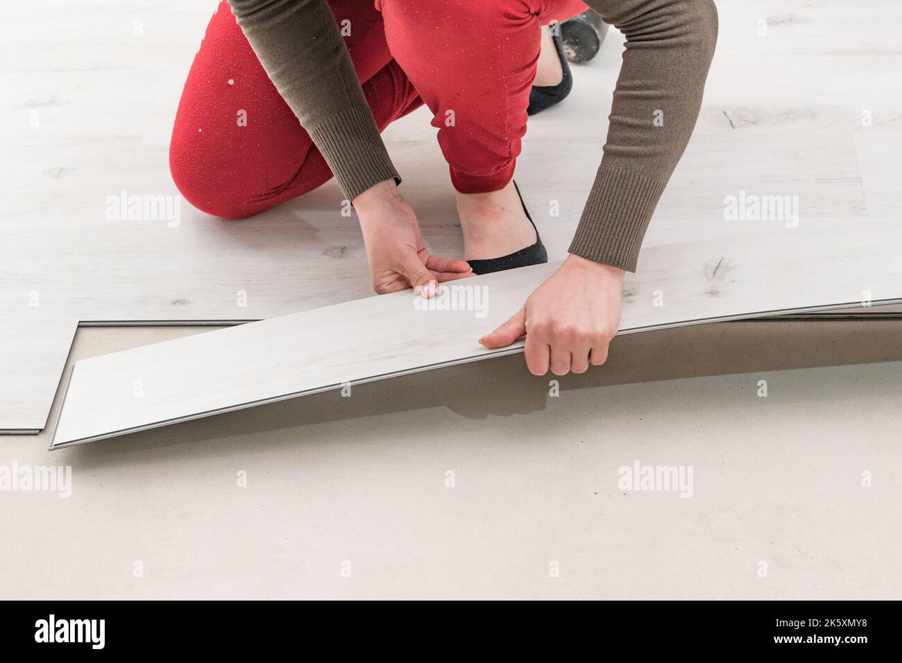 Floor installation, a new style of quartz vinyl floor, repair work to ...