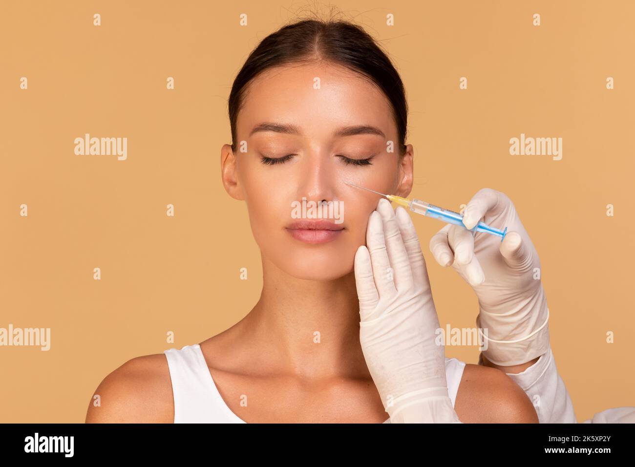 Plastic surgery and beauty injection concept. Attractive young woman ...