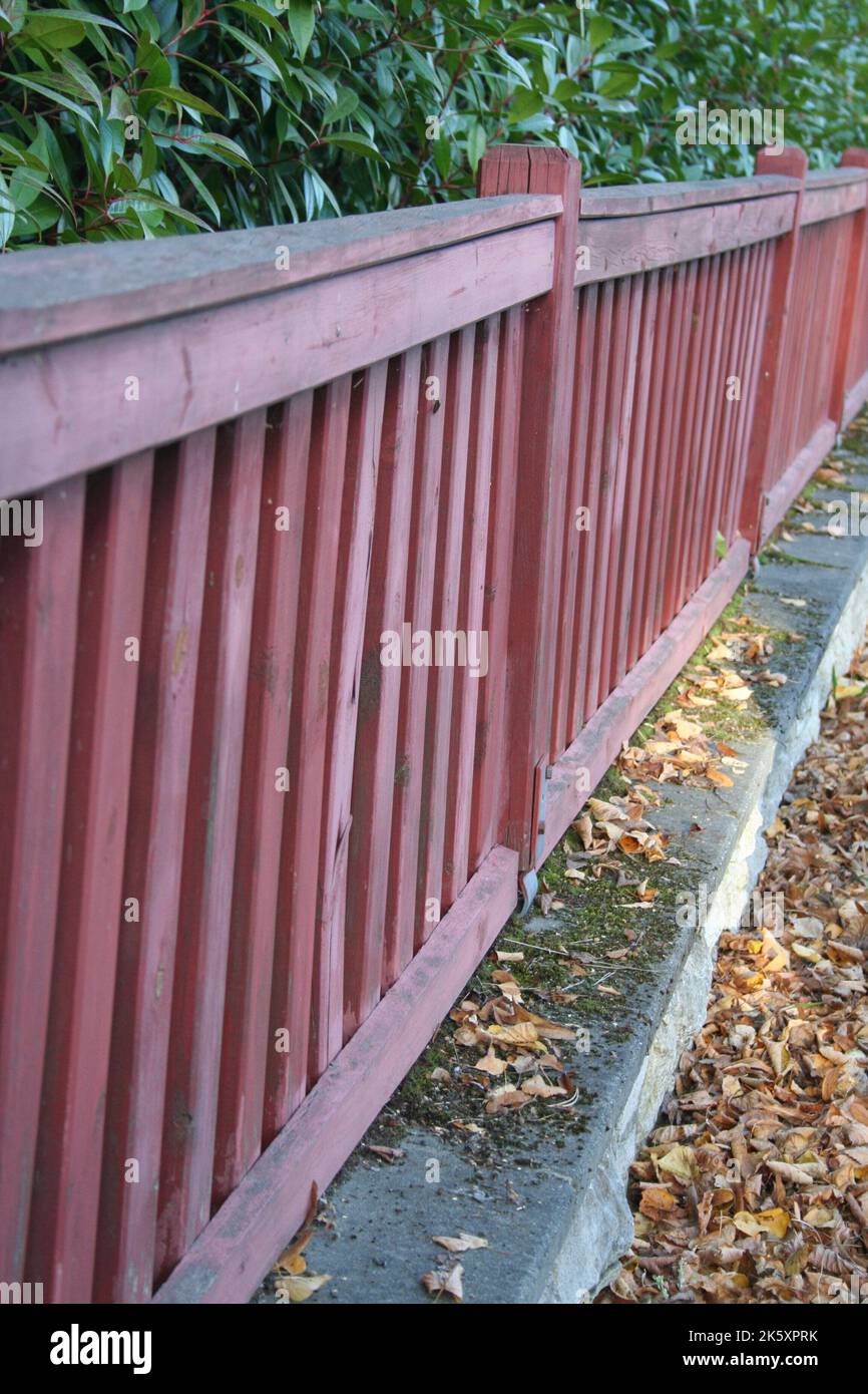 red fence at a german garden Stock Photo - Alamy