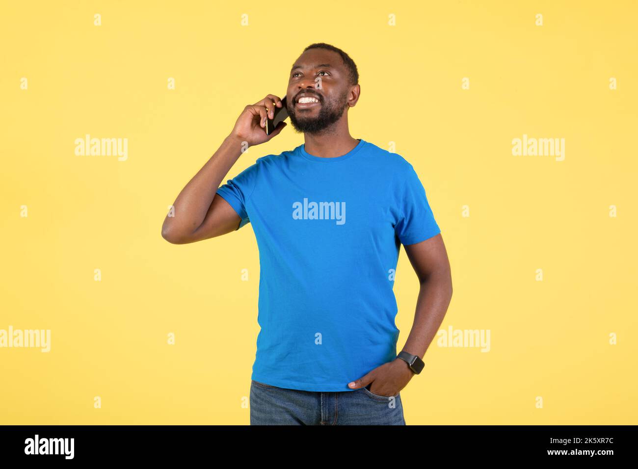 Cheerful Black Man Talking On Cellphone On Yellow Background Stock ...