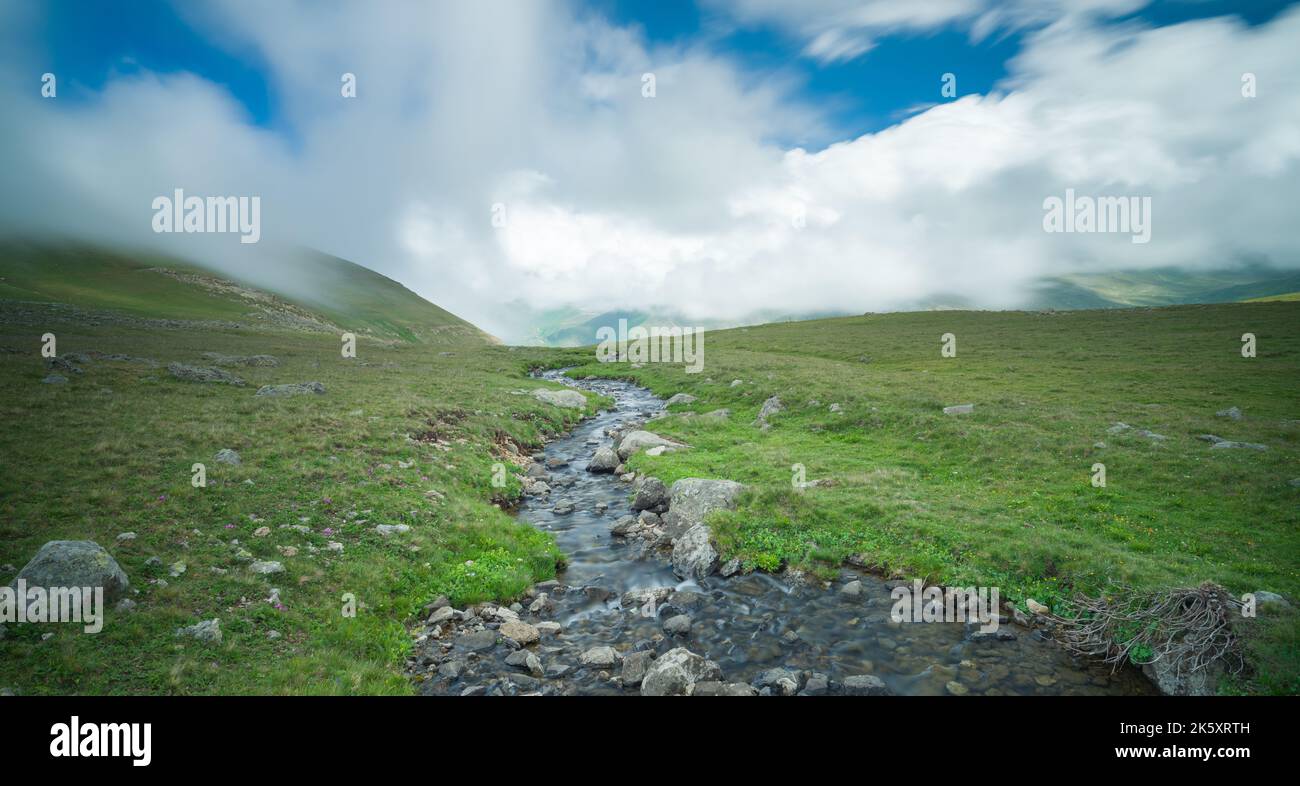 Nature background. Mountain stream. Small rivers and sky on high ...
