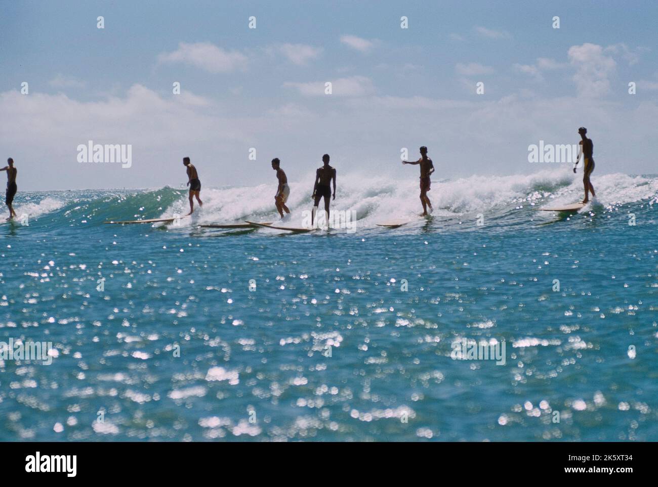 Silhouette of Surfers riding a Wave, Oahu, Hawaii, USA, Toni Frissell ...