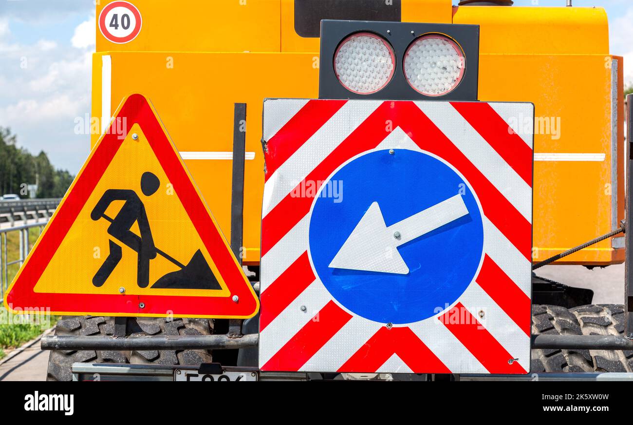 Road works traffic signs on the truck close up Stock Photo - Alamy