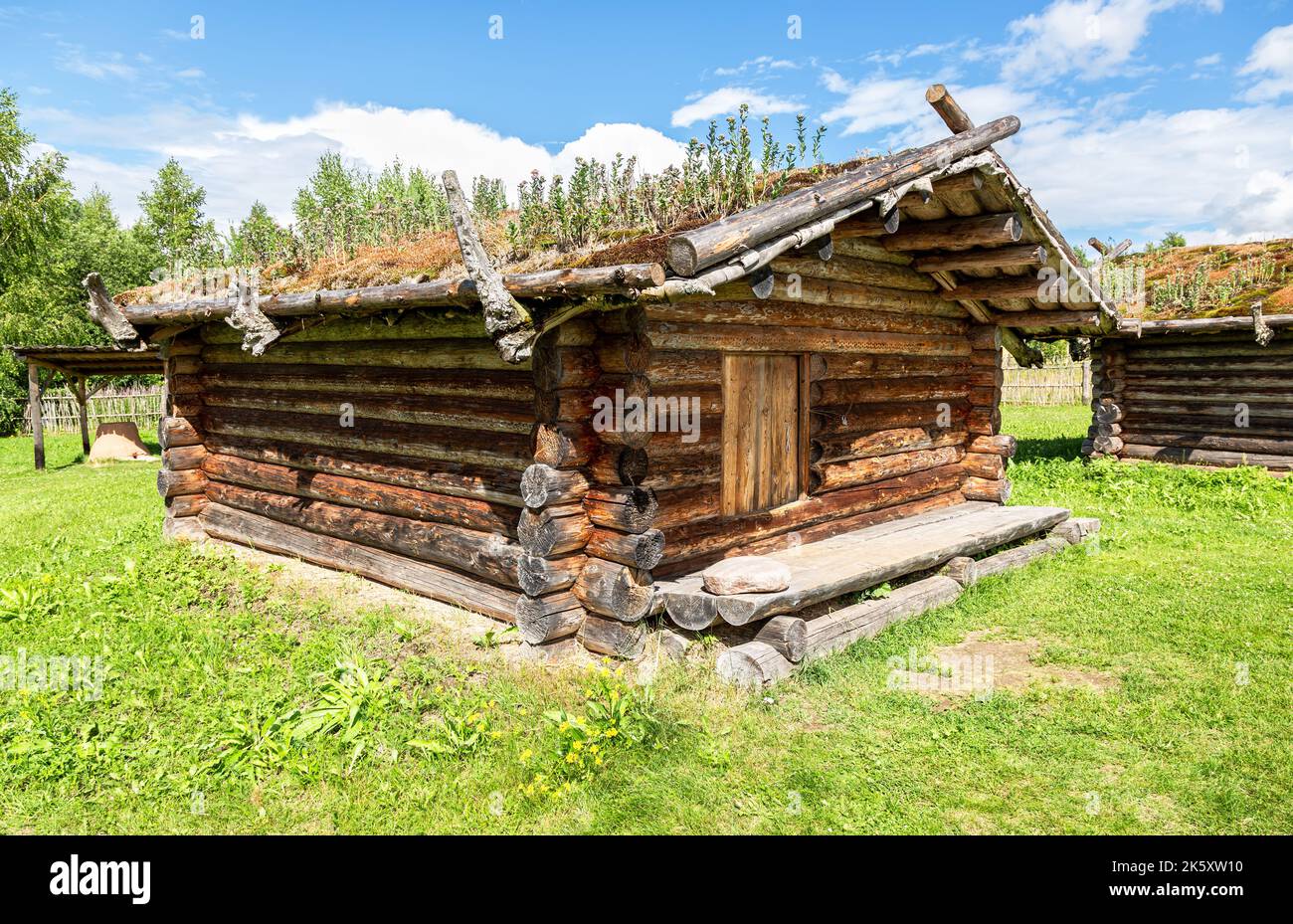 Ancient slavic village. Ancient wooden residential house in Russia. X ...