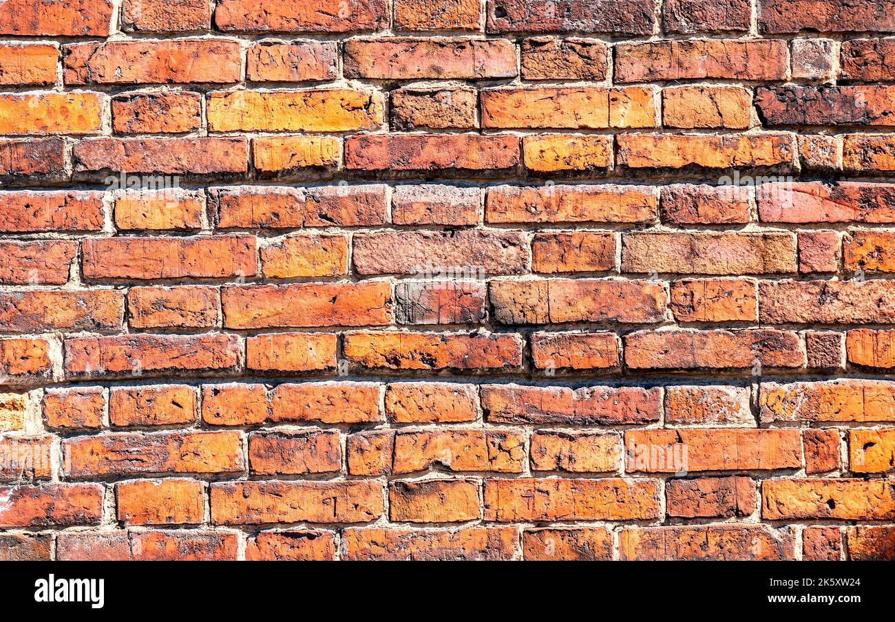 Old weathered red brick wall as creative background Stock Photo - Alamy