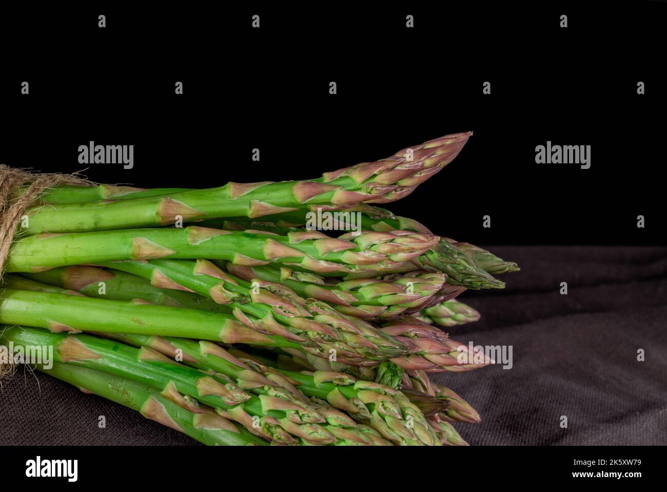 Fresh asparagus on table close up horizontal Stock Photo - Alamy