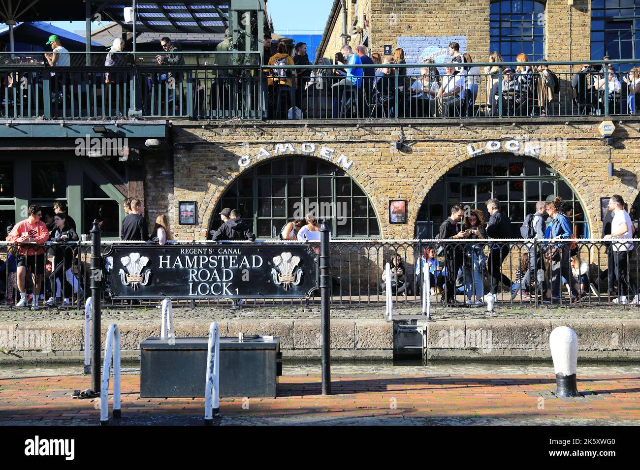 Dingwalls lively pub on Camden Lock by Regents Canal busy in warm ...