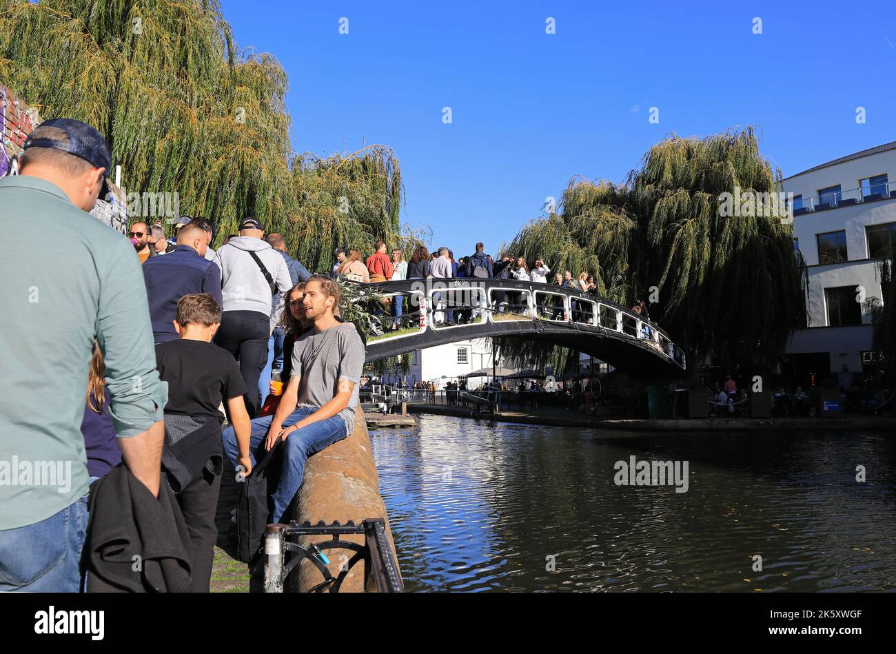 The bridge over the Regents Canal at Camden Lock, busy in autumn ...