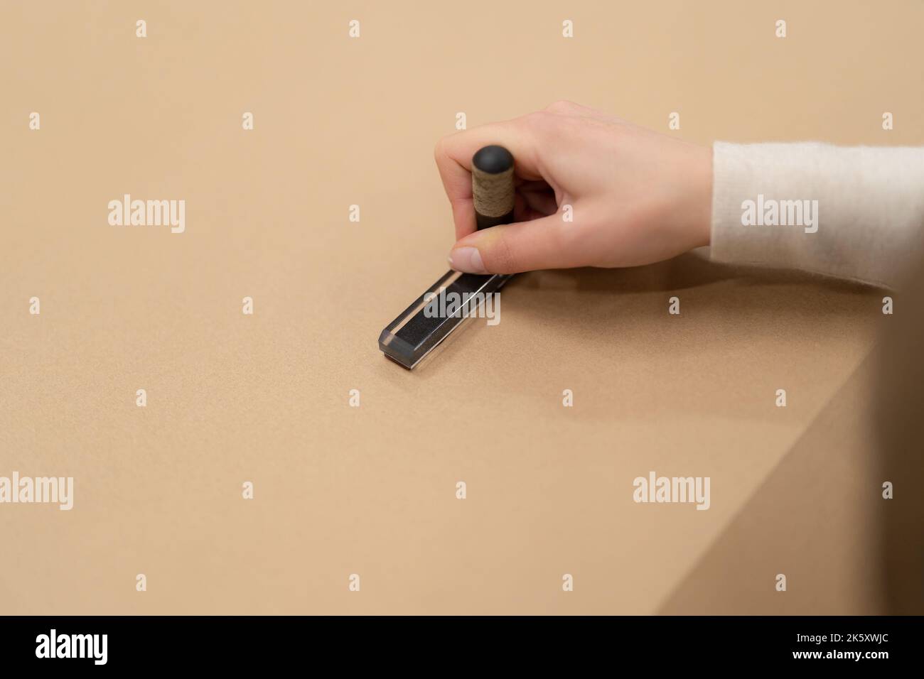 Hand placing gift hi-res stock photography and images - Alamy