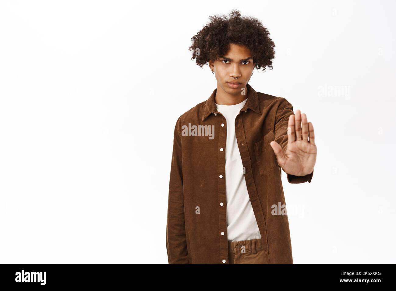 Enough, please stop. Serious hispanic guy showing prohibit, rejection ...