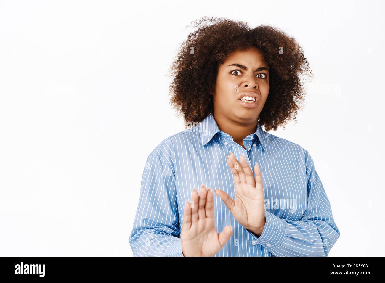 No thanks. Disgusted african american woman cringe from smth, raising ...