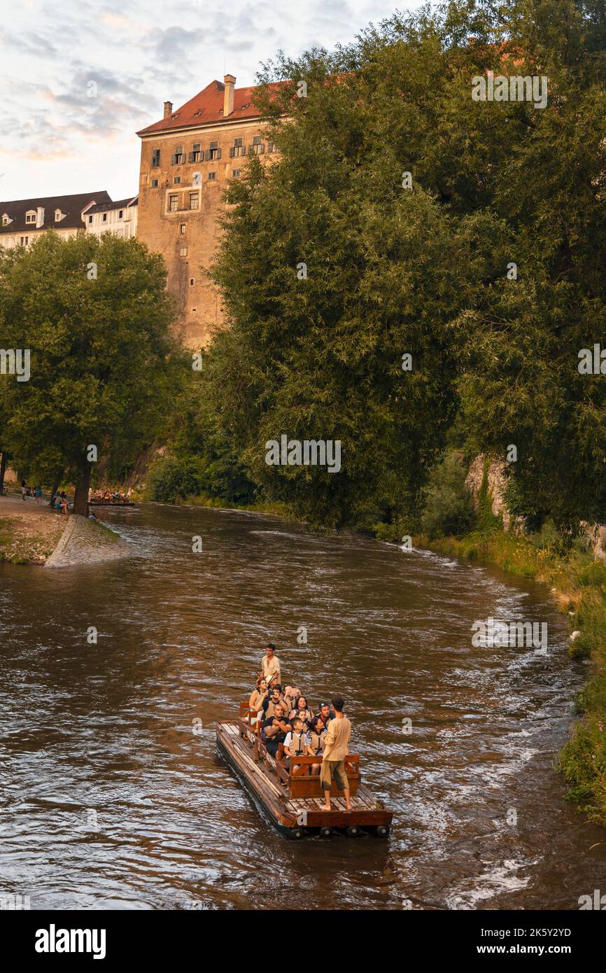 People on wooden raft (vor) on Vltava river in the historical town of ...
