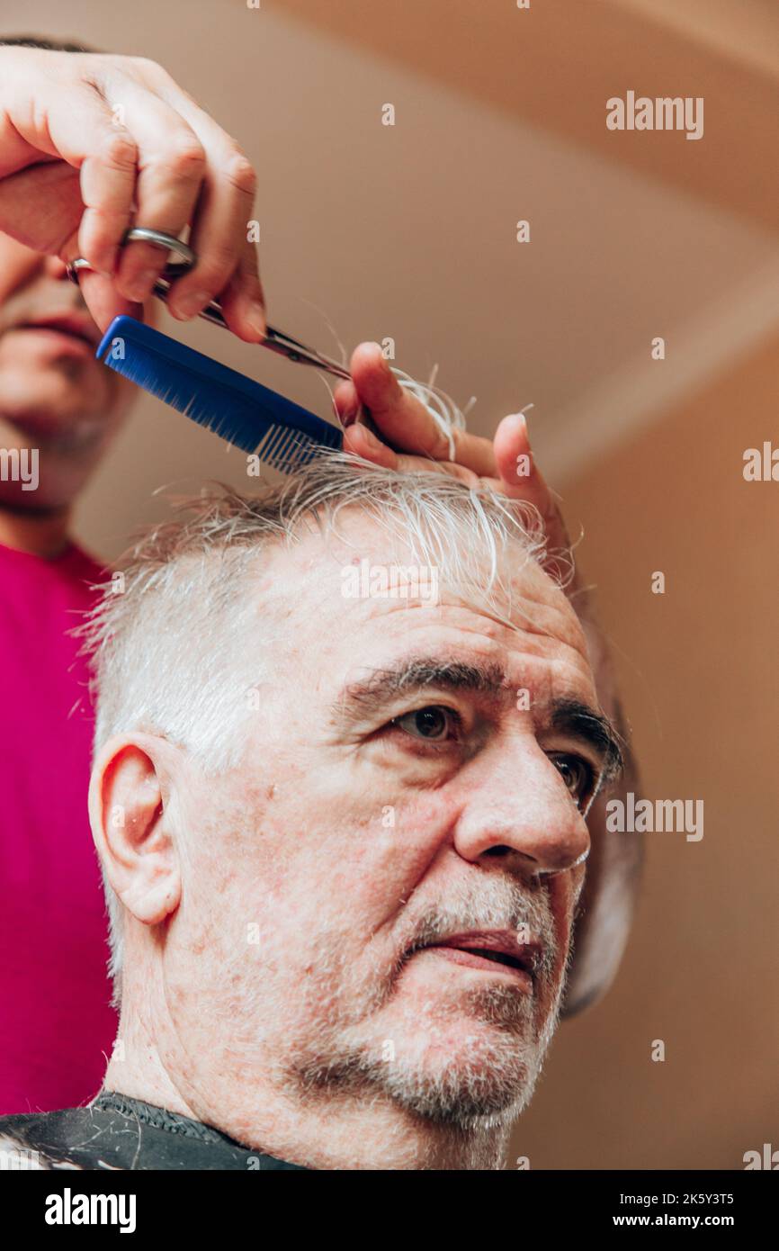 old man getting a haircut Stock Photo - Alamy