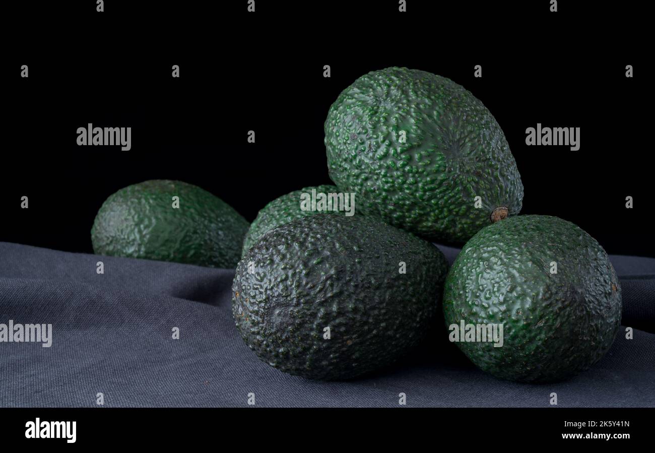 Persea americana fruit cut into two with seed, Avocado Stock Photo - Alamy
