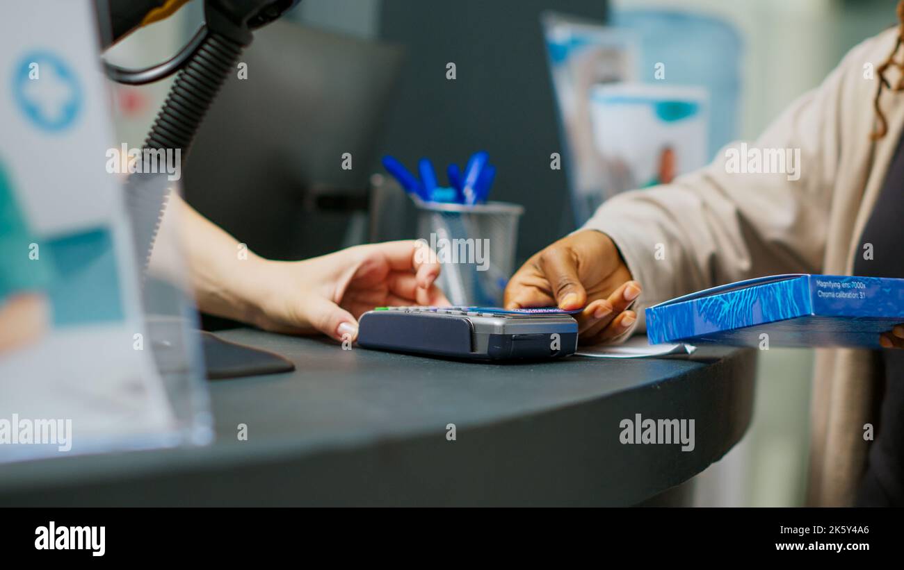 Elderly client buying medicaments debit hi-res stock photography and ...