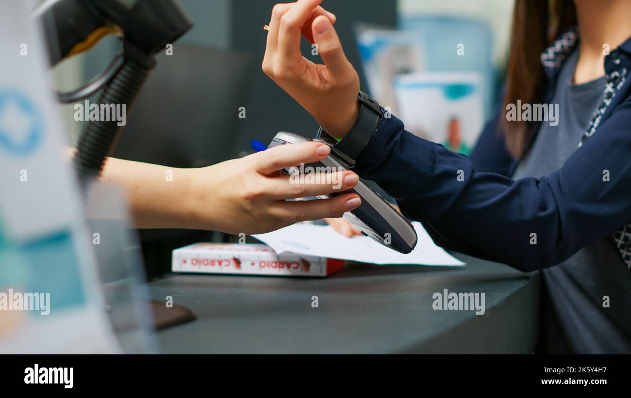 Senior client paying supplements hi-res stock photography and images ...