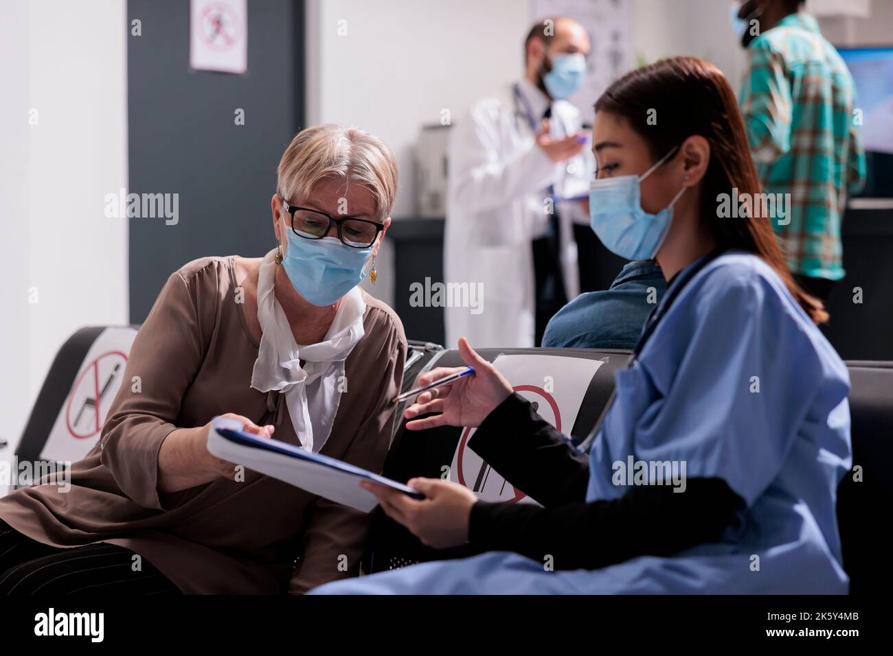 Patient attending to senior hi-res stock photography and images - Alamy