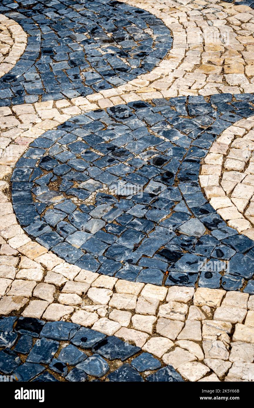 Handmade pavement (Calcada portuguesa) in Lisbon, Portugal, made with ...