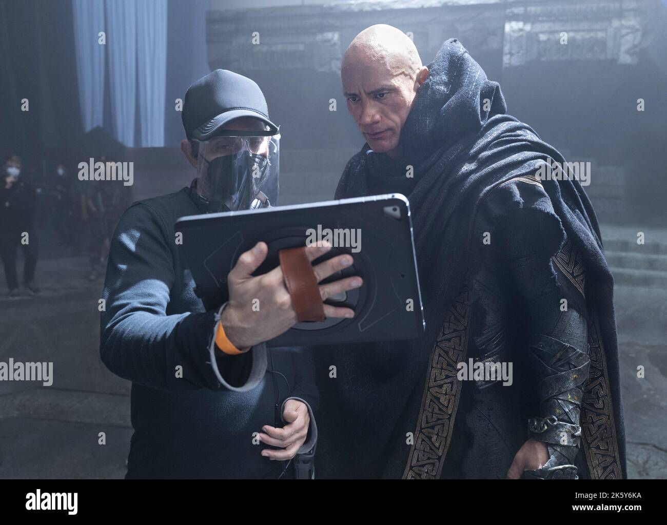 BLACK ADAM, from left: director Jaume Collet-Serra, Dwayne Johnson, on ...