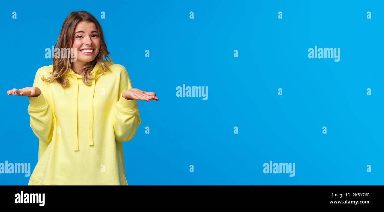 Oops sorry, no big deal. Carefree cute unbothered young blond girl ...