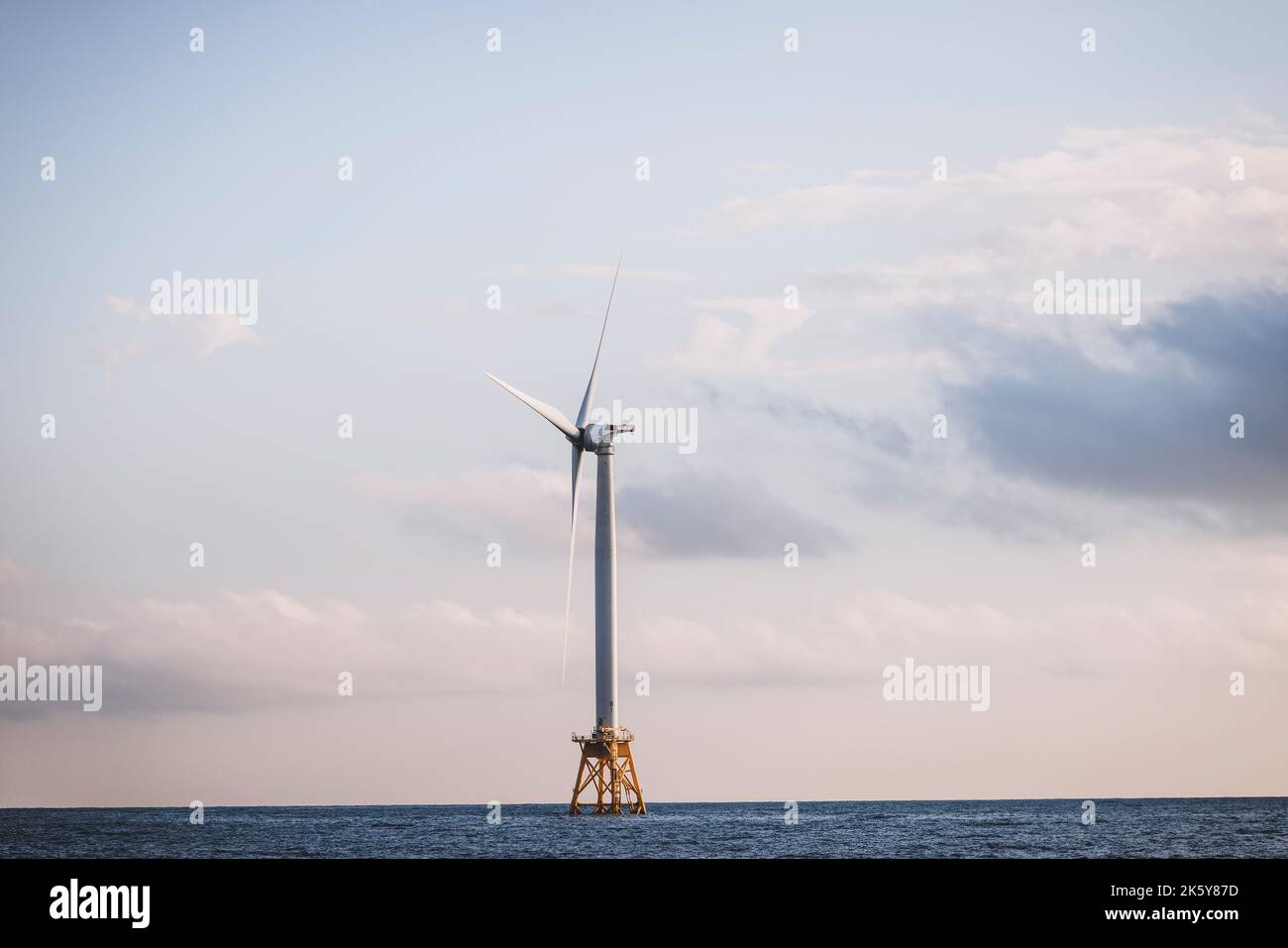 A single renewable energy off shore wind turbine in the ocean Stock ... A single renewable energy off shore wind turbine in the ocean Stock ...