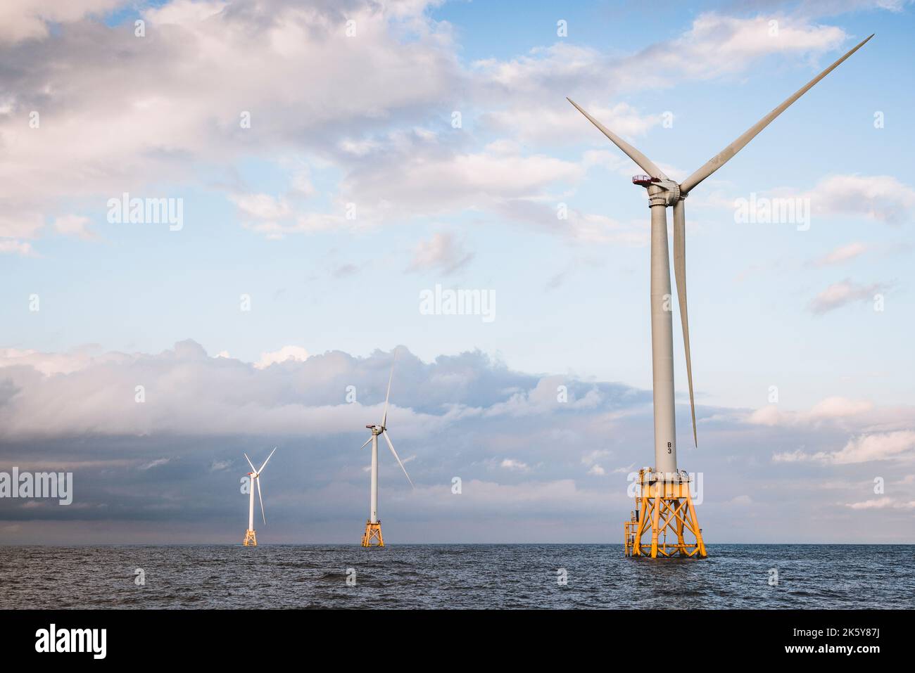 Wind turbines sitting off shore in the Atlantic Ocean Stock Photo - Alamy