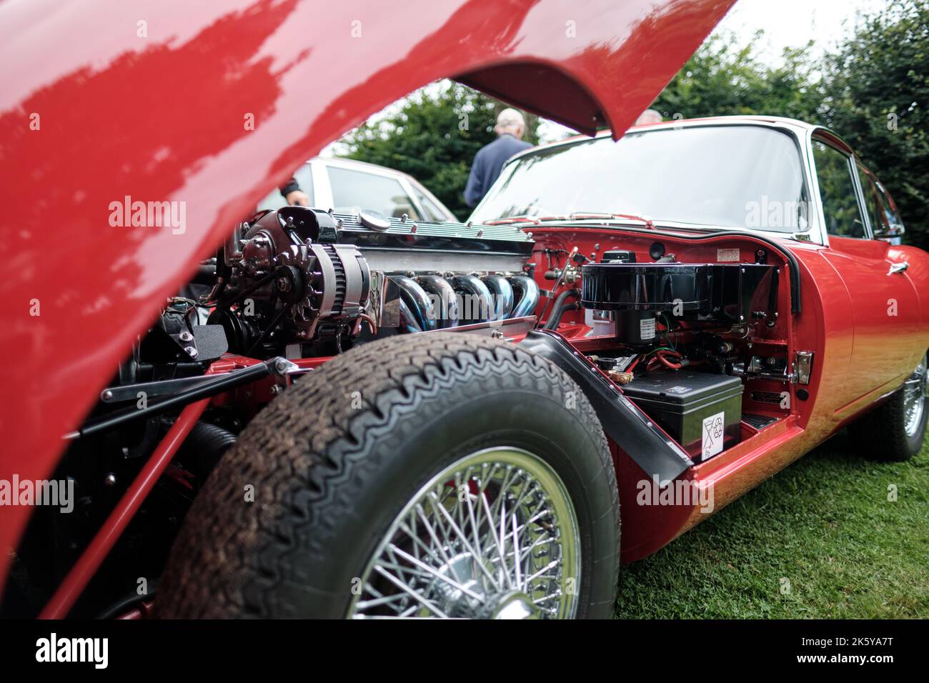 The engine and the tire of a red retro car Stock Photo - Alamy