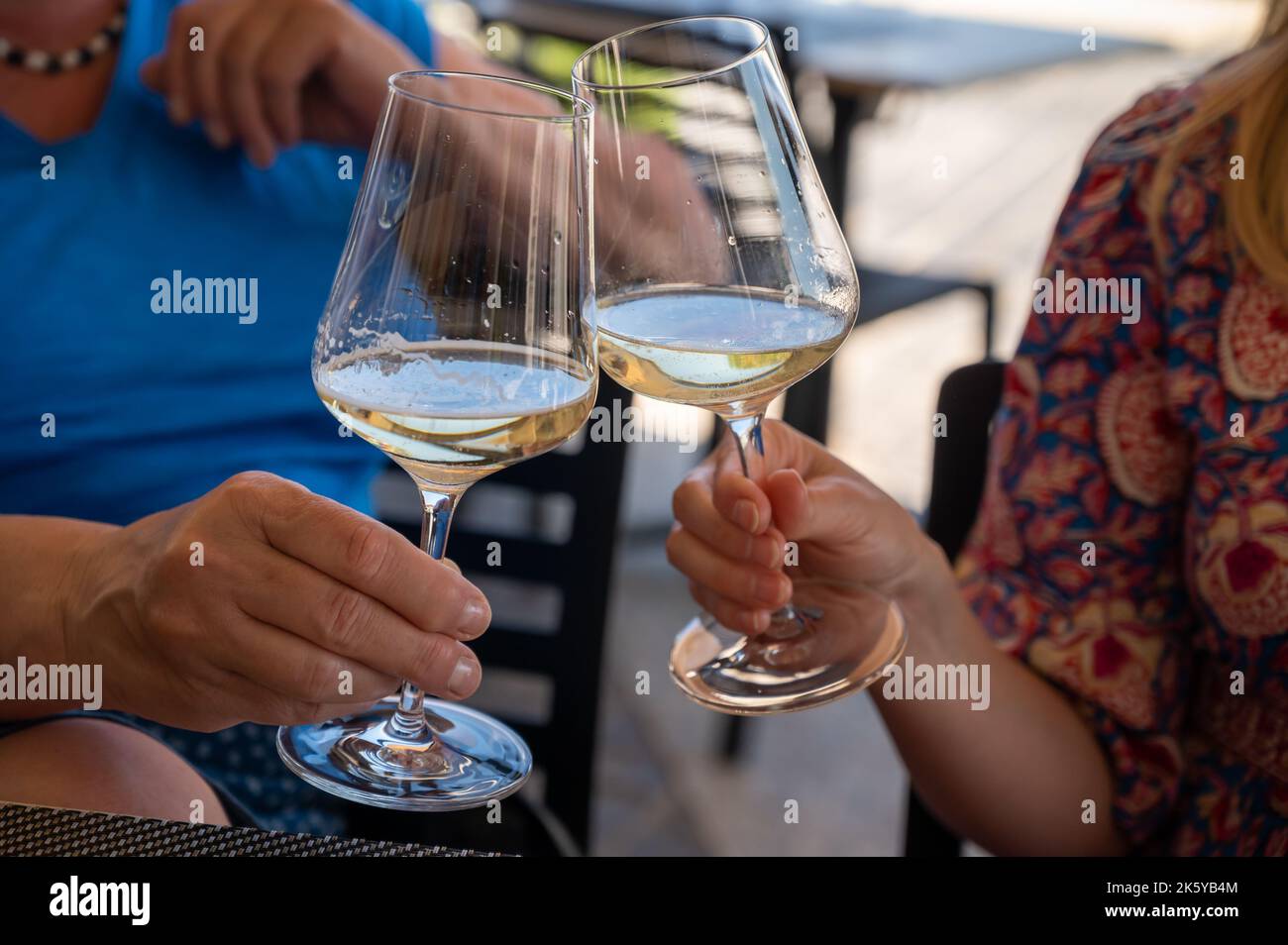 Drinking of txakoli or chacolí slightly sparkling very dry white wine ...
