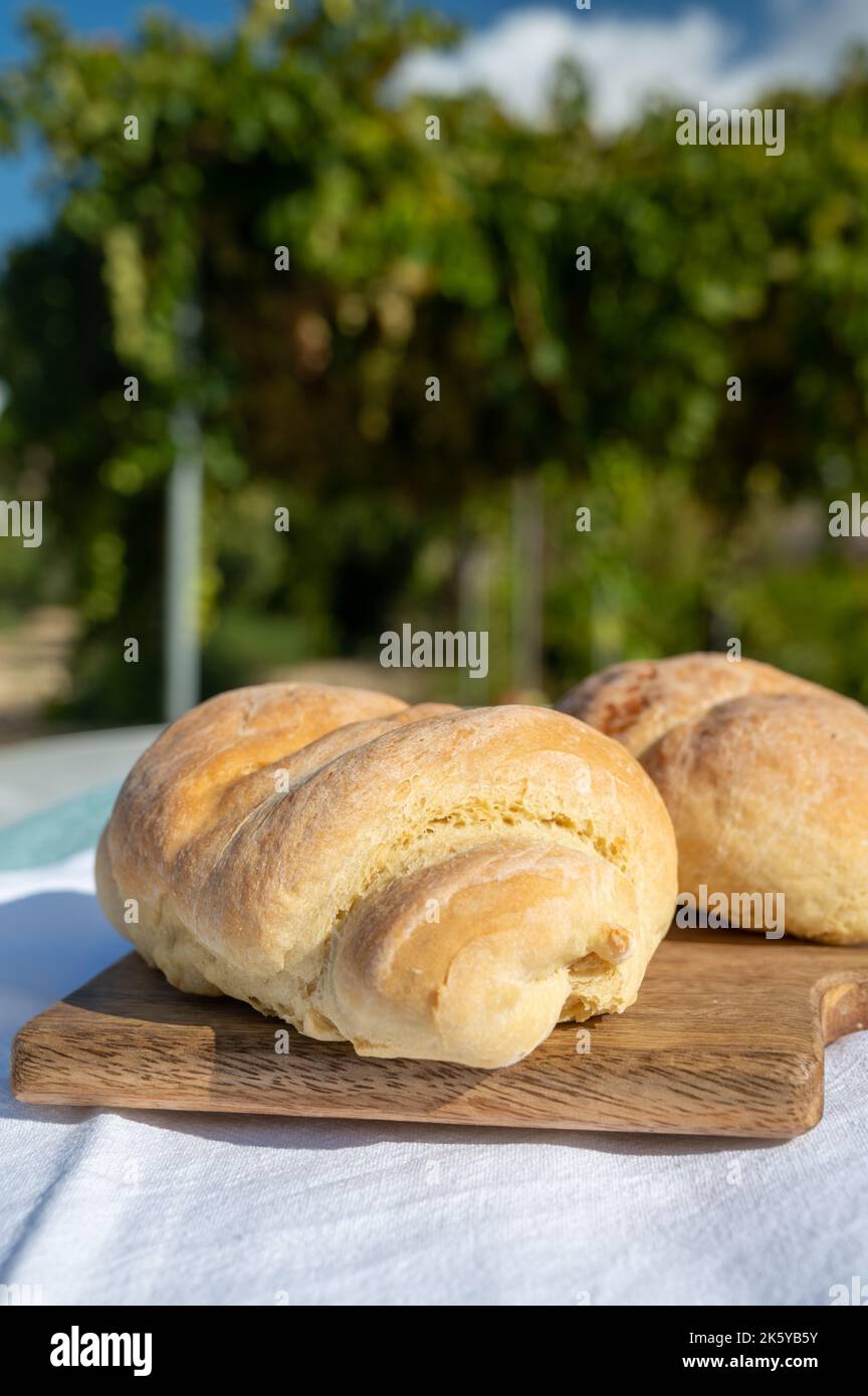 Artisan homemade wheat bread with olives baked in small mountain ...